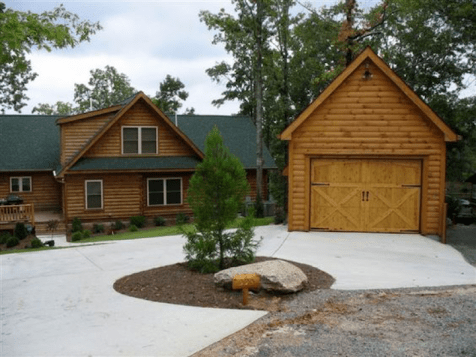 8 Log Cabin Garages Made From Logs and Timber - Log Cabin Hub
